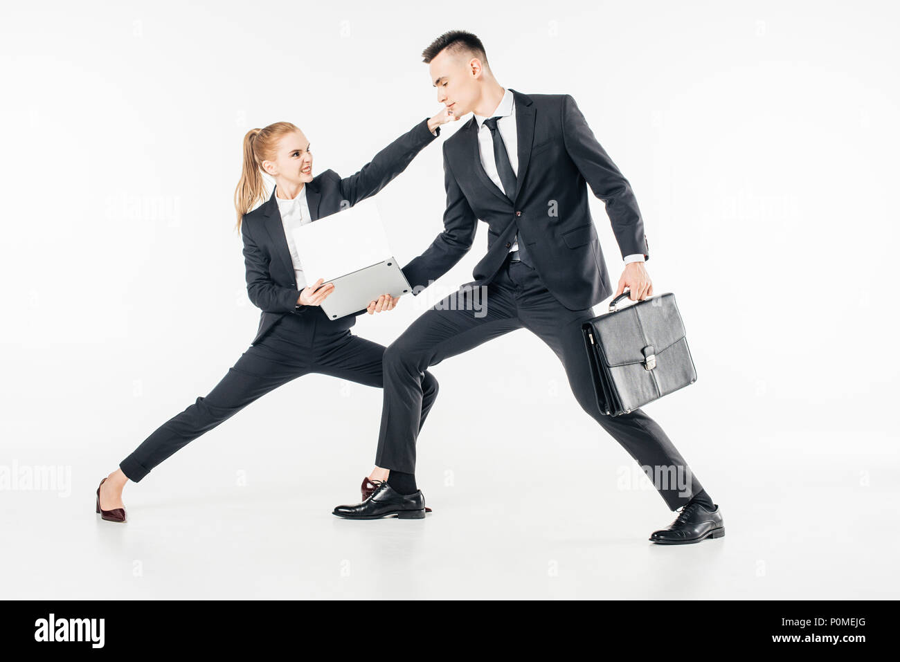 People fighting in business suits hi-res stock photography and images ...