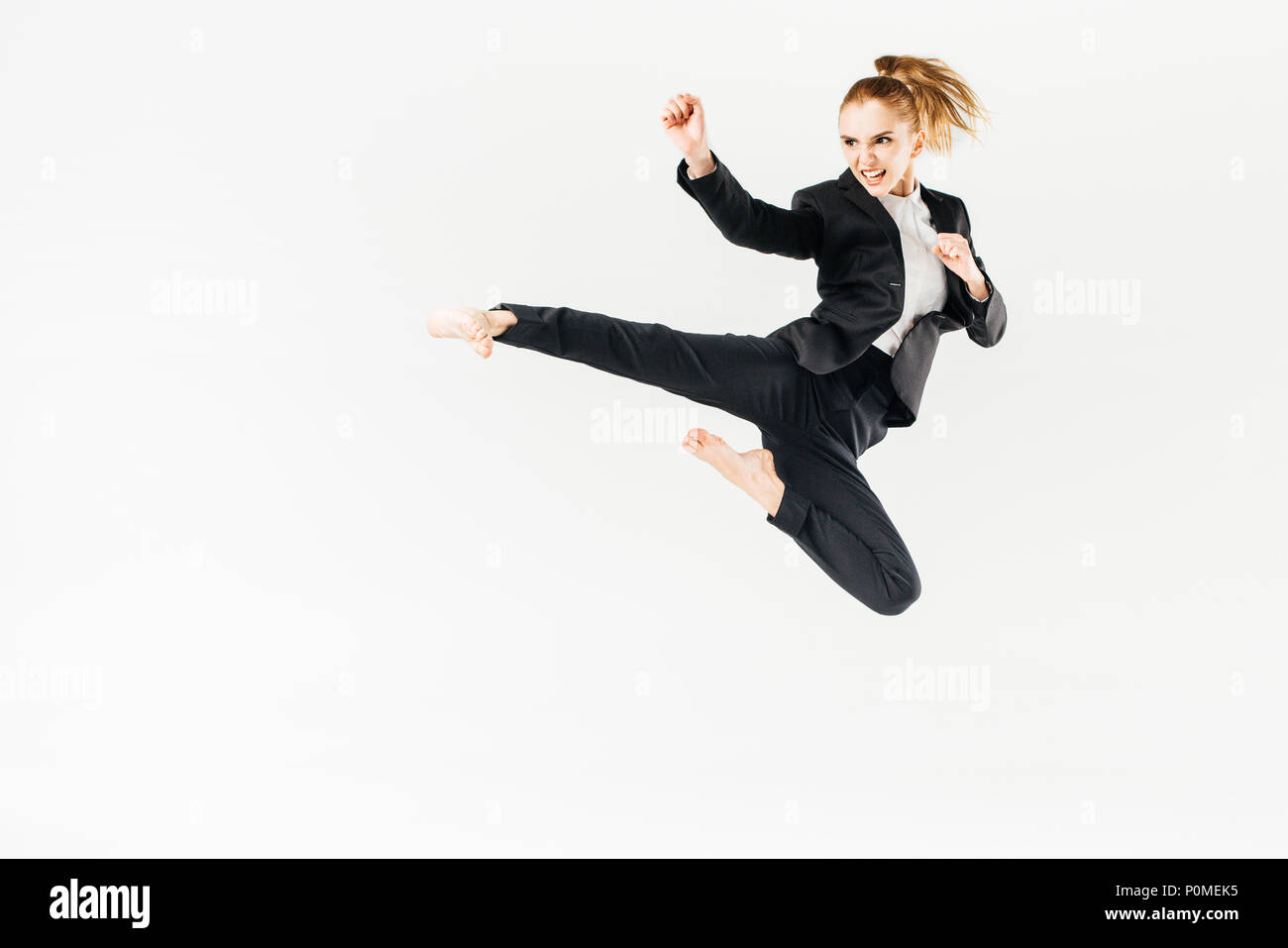 Business female kick hi-res stock photography and images - Alamy