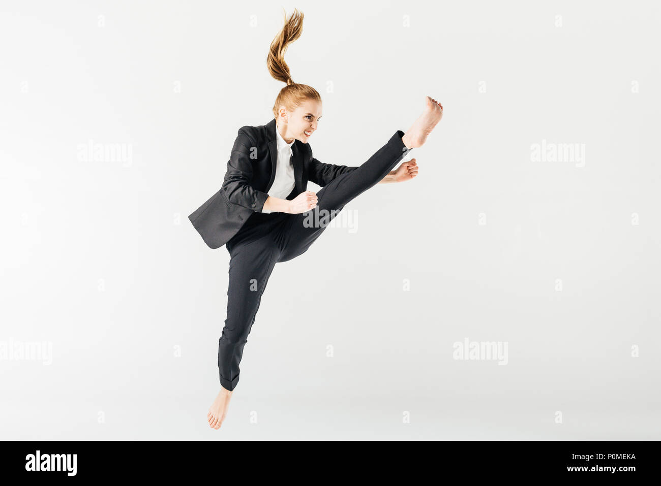 Business female kick hi-res stock photography and images - Alamy