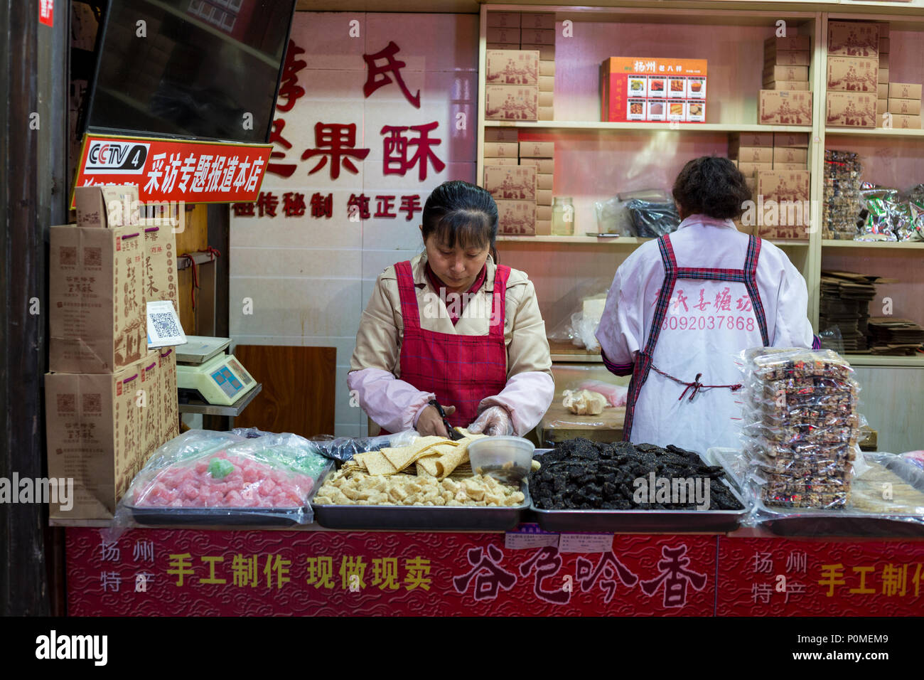 Yangzhou, Jiangsu, China. Snacks and candy Vendor, Dong Guan Street ...