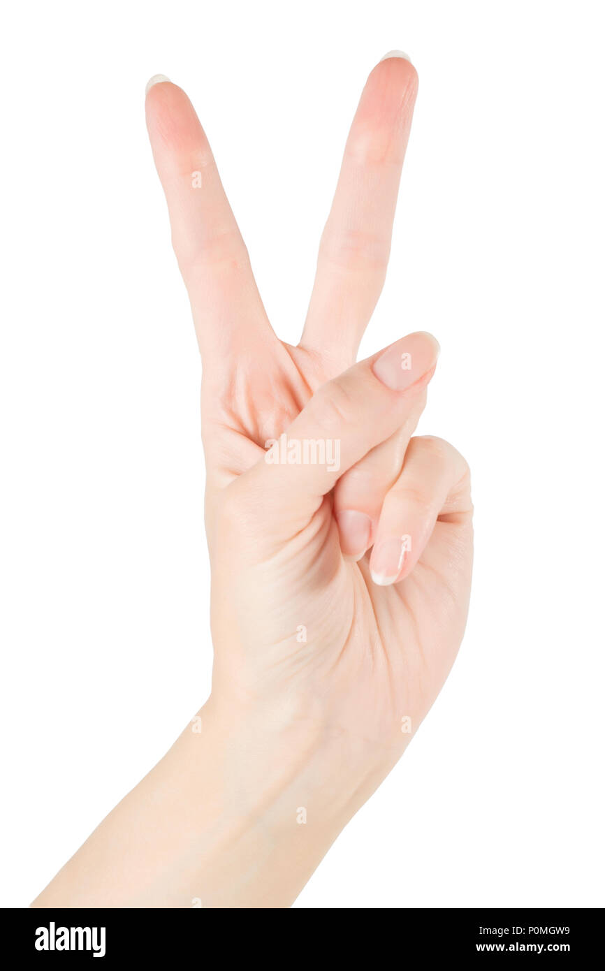 Beautiful woman hand showing victory gesture. Isolated on white ...
