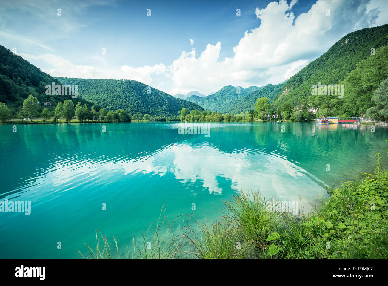 Emerald green water at Most na Soci Lake in Slovenia Stock Photo - Alamy