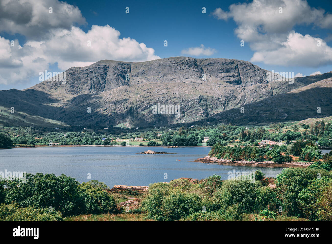 The scenic fields and sea as seen from road leading to Healy pass, from ...