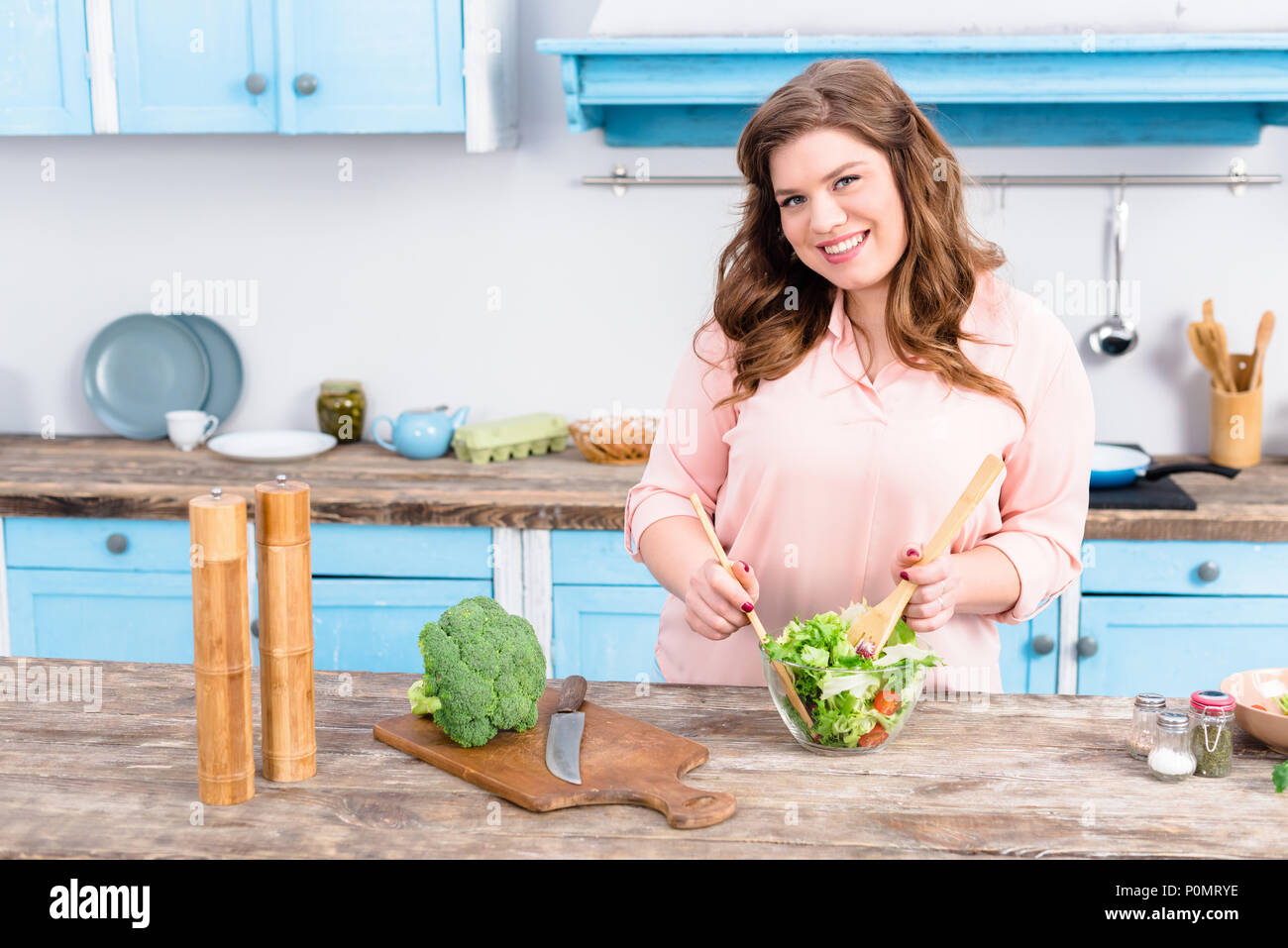 Overweight adult meal preparation hi-res stock photography and images ...