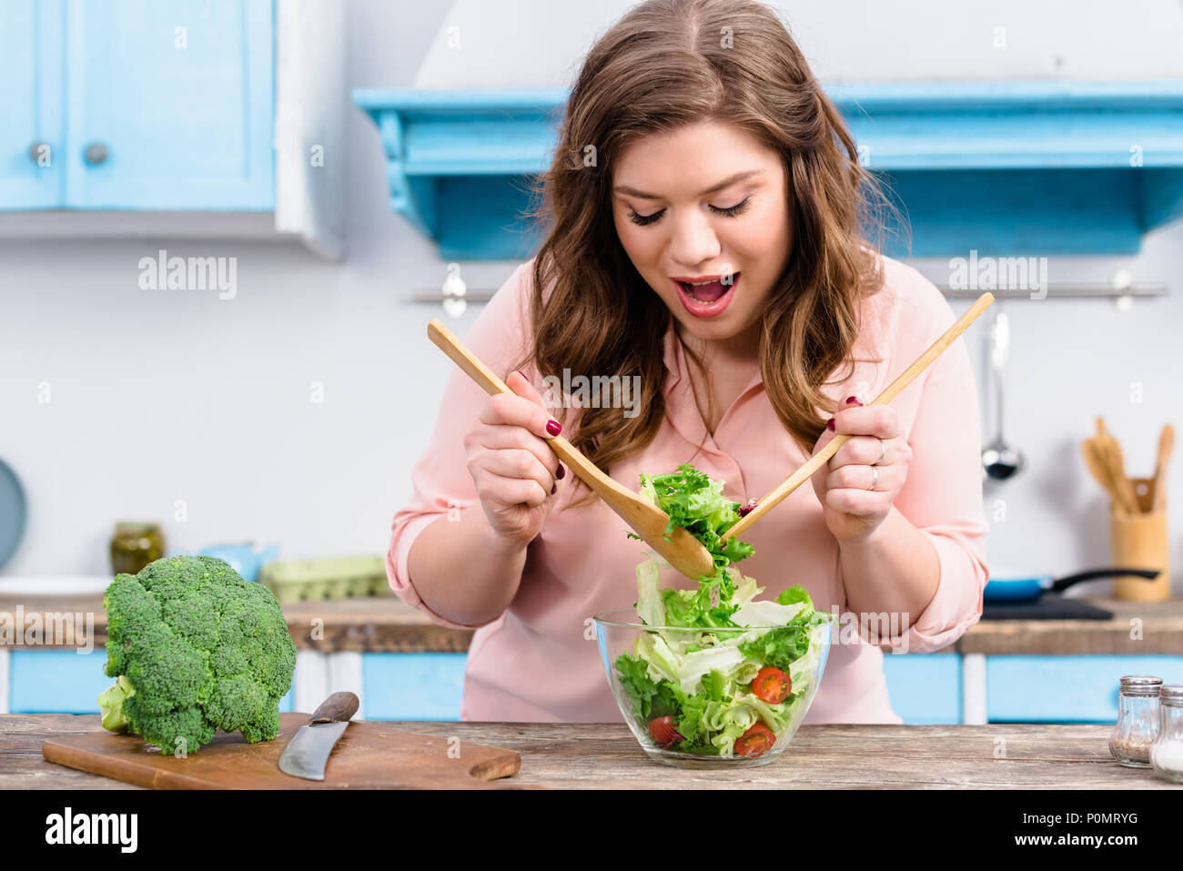 Overweight adult meal preparation hi-res stock photography and images ...