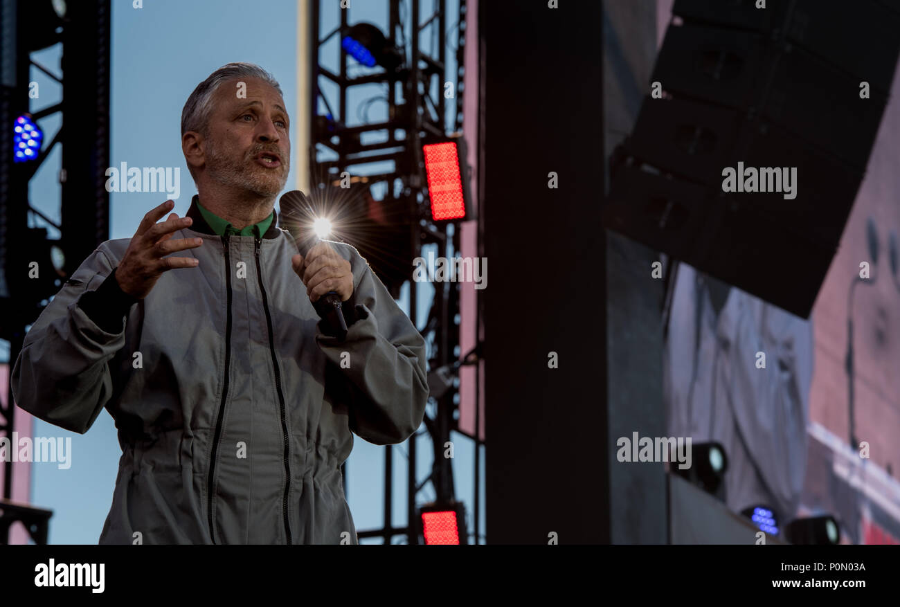Comedian Jon Stewart, makes opening remarks during Opening Ceremonies ...