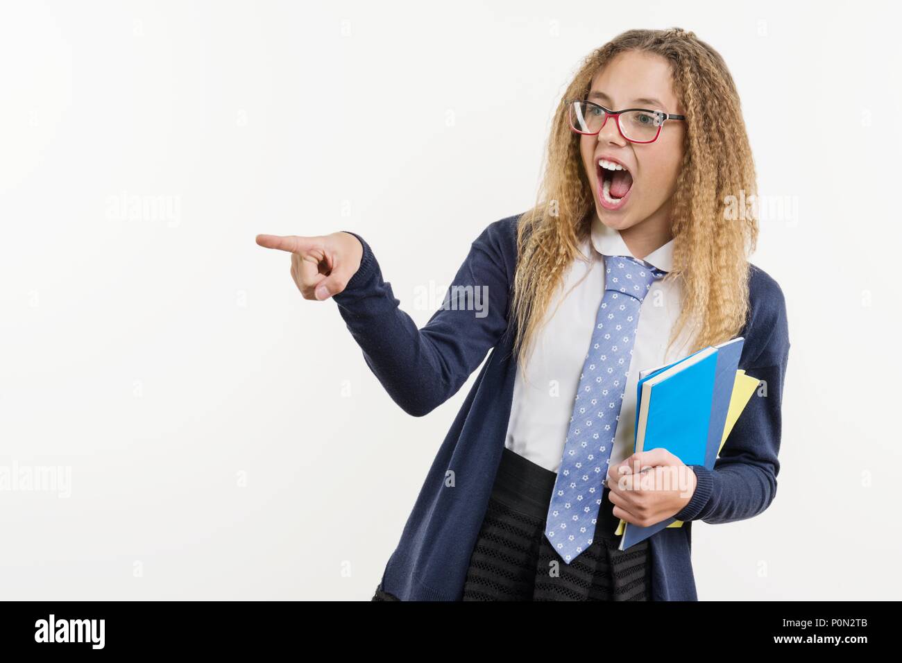 Girl teenager, high school student, on white background, in school ...