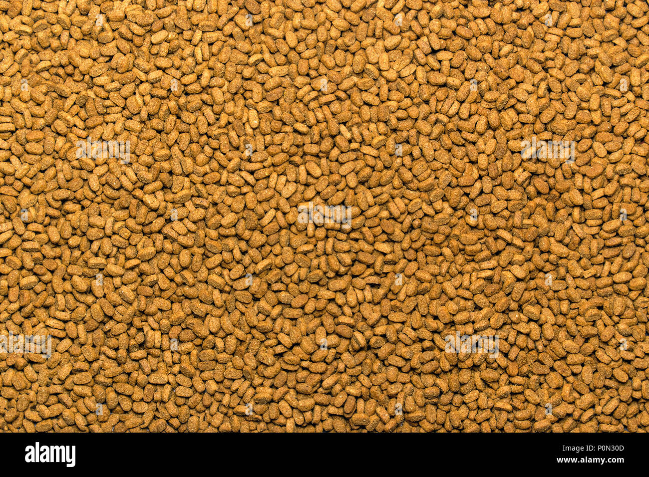 Dog and cat, pet food pellets closeup, full frame texture Stock Photo ...