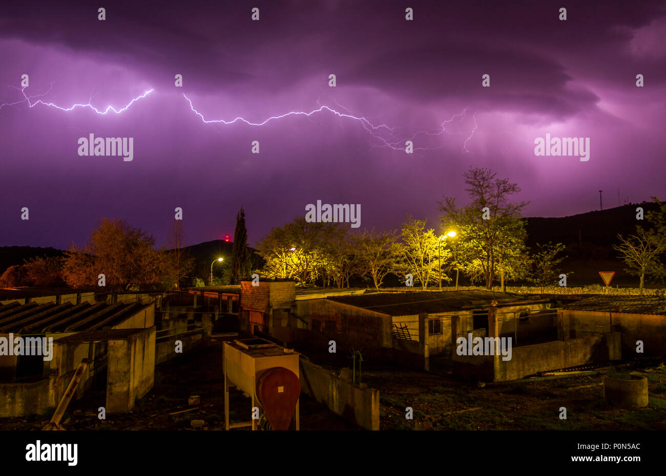 Thunderbolt lightning in evening town hi-res stock photography and ...