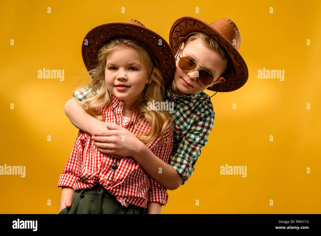 Friends friendship hugging cowboy hi-res stock photography and images ...