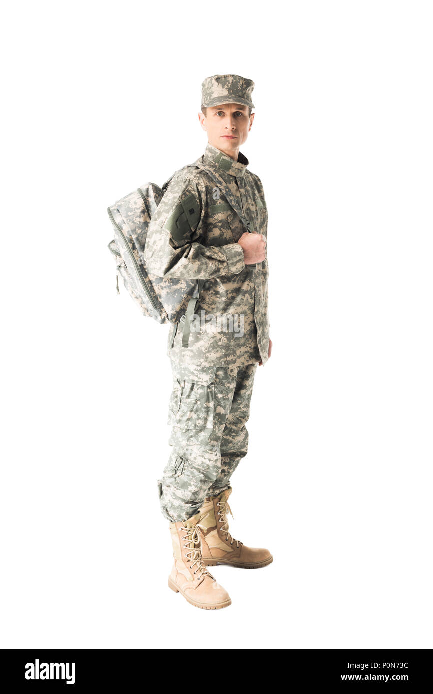 Handsome army soldier in uniform holding backpack isolated on white ...
