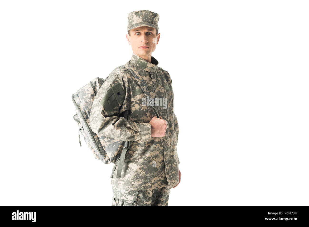 Confident army soldier in uniform holding backpack isolated on white ...