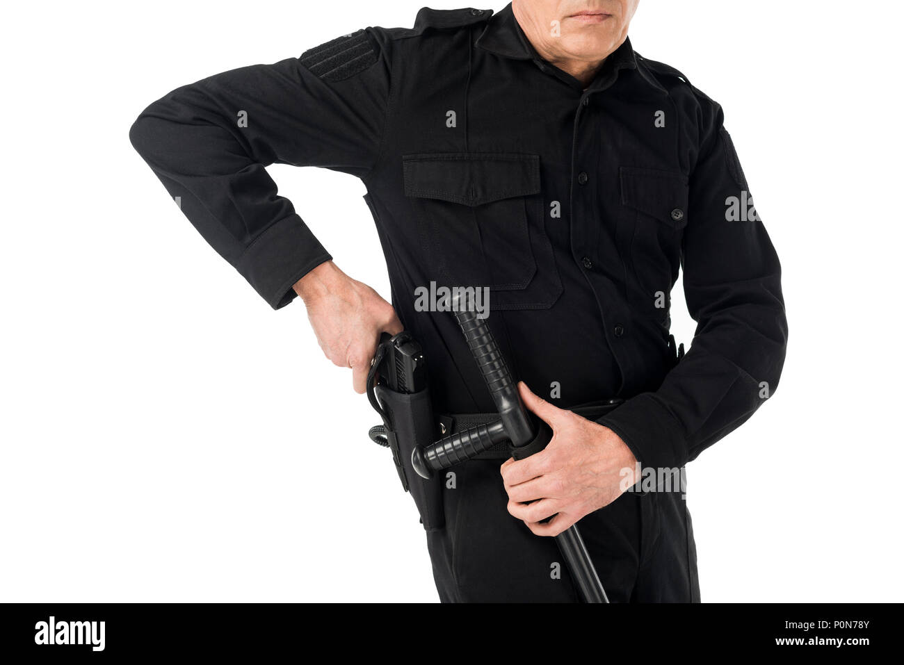 Close-up view of policeman in uniform pulling out gun isolated on white ...