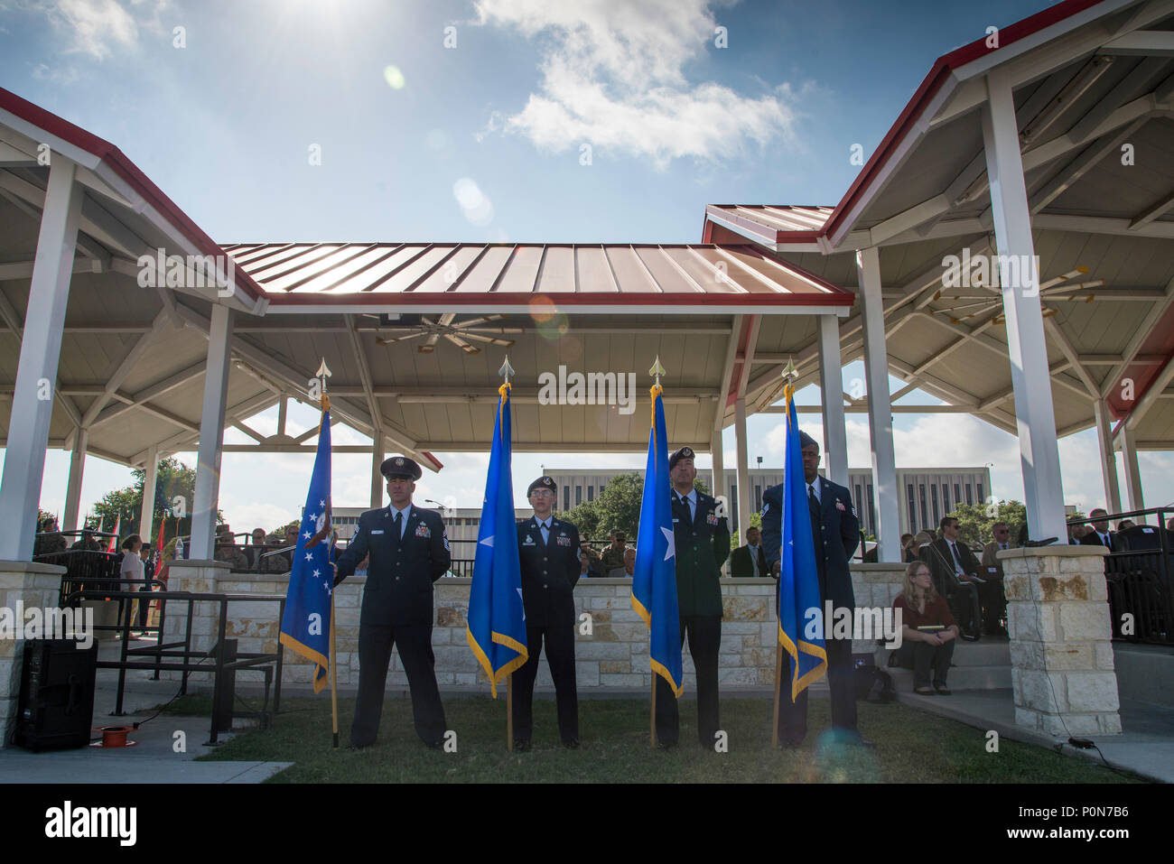 Members of the 502nd Air Base Wing hold guideons during the 502nd ABW ...