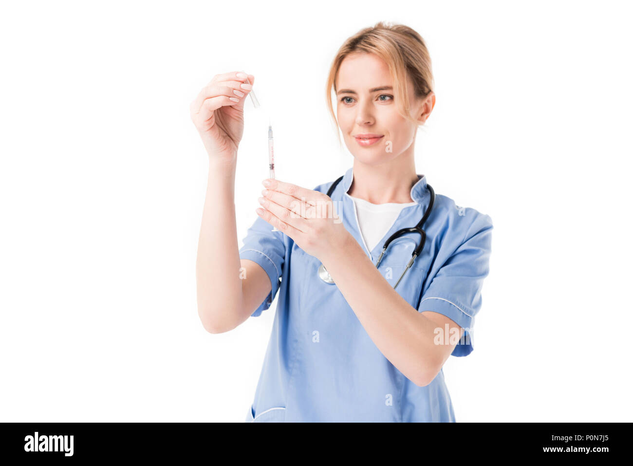 Nurse holding syringe hi-res stock photography and images - Alamy