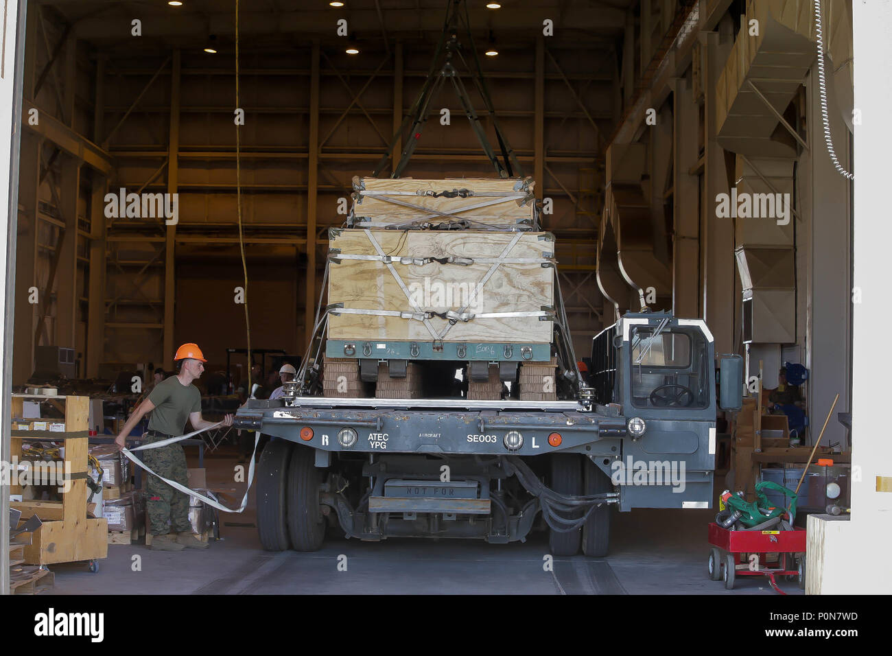 U.S. Marine Corps Cpl. Marcus Auge an airborne and air delivery ...