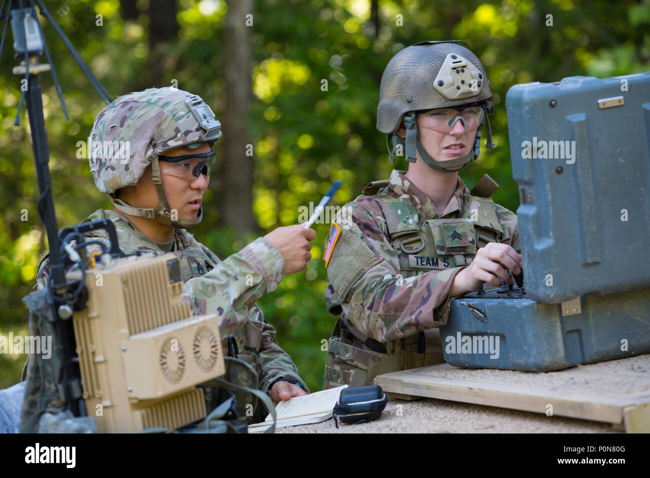 (From left) Staff. Sgt. James Ahn, an explosive disposal team leader ...