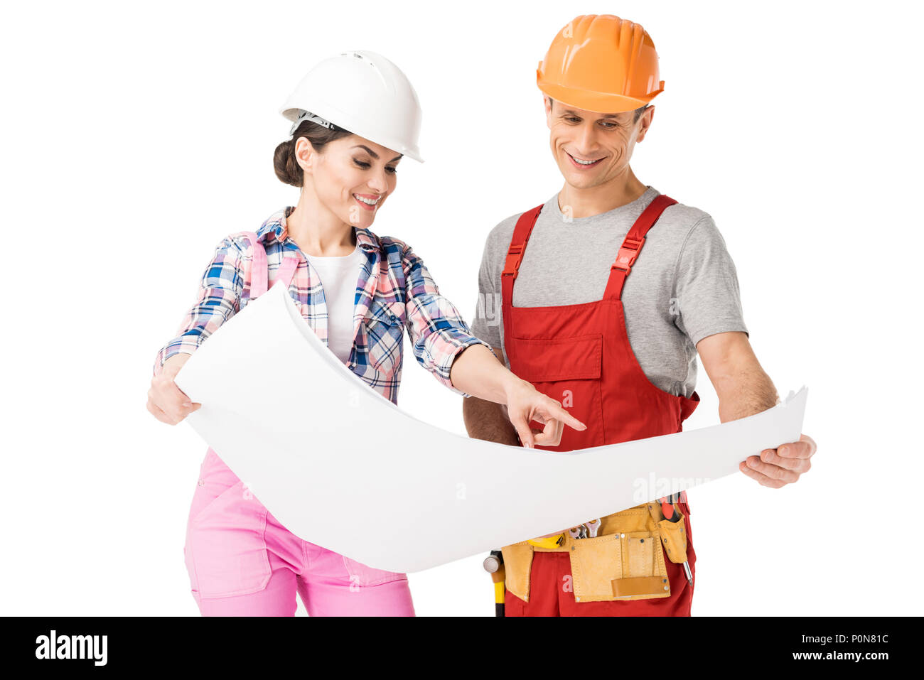 Man and woman builders looking at blueprint isolated on white Stock ...