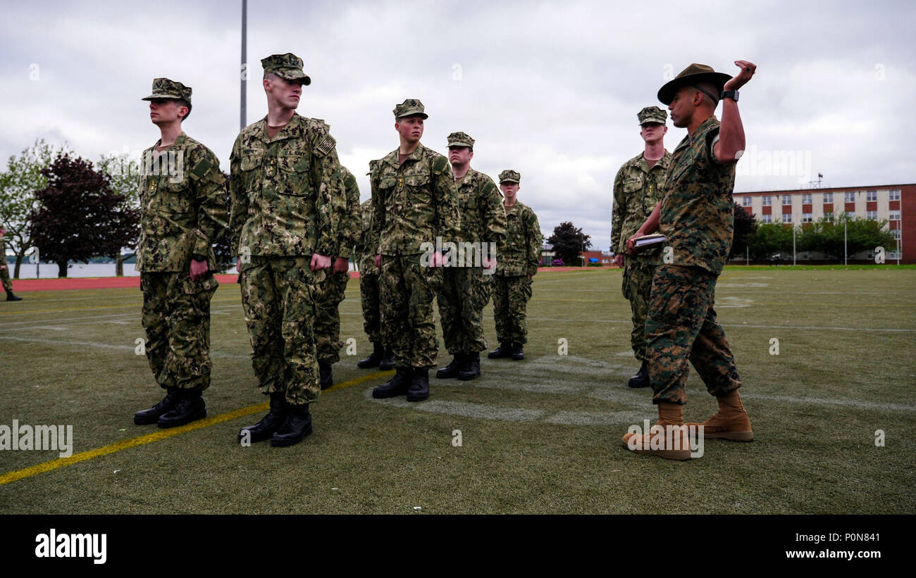 NEWPORT, R.I. (June 6, 2018) – Master Sgt. Josiah Moreno, right, trains ...