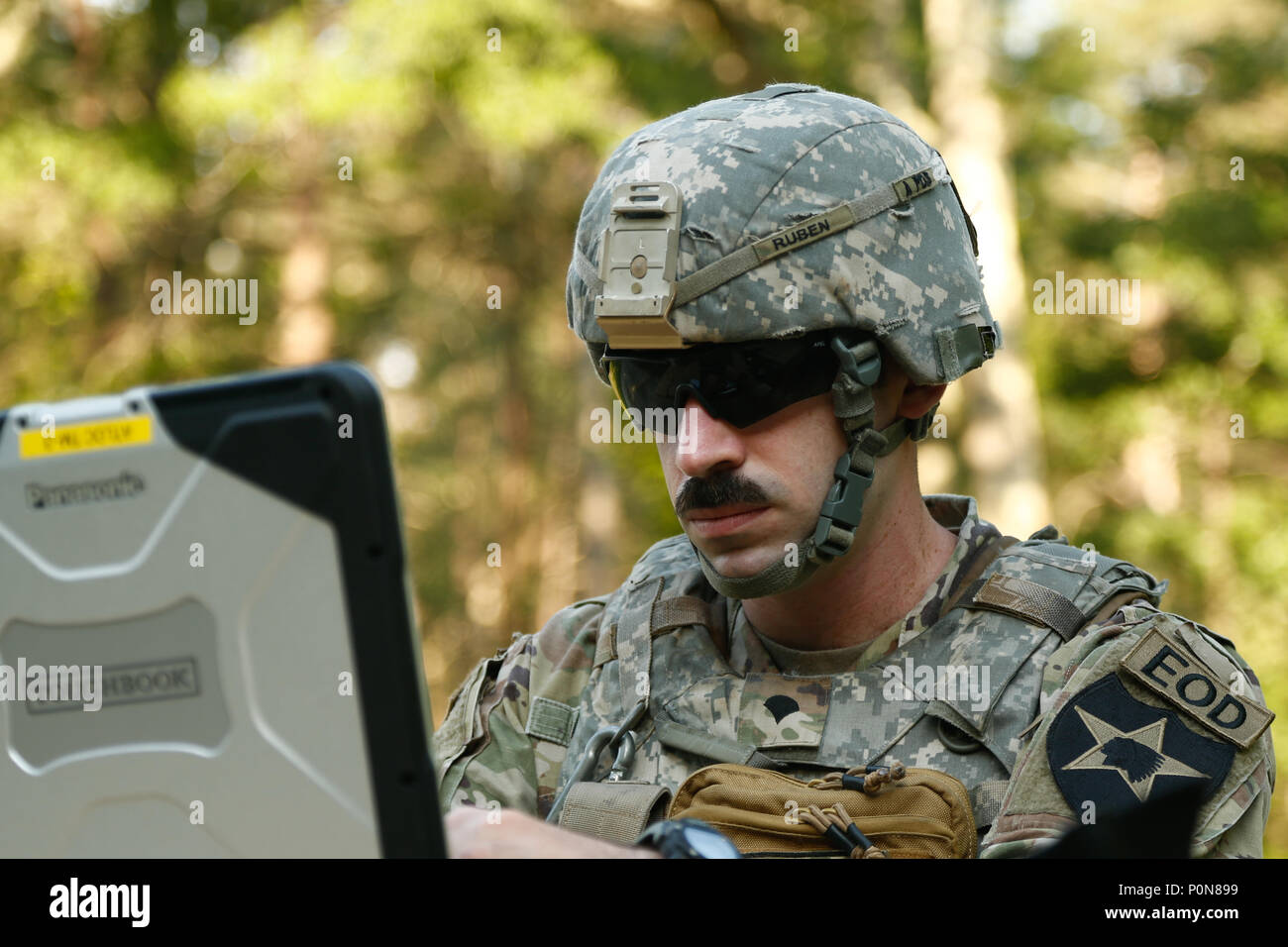 Spc. Matthew Ruben, an explosive ordnance disposal team member with the 718th Ordnance Company ...