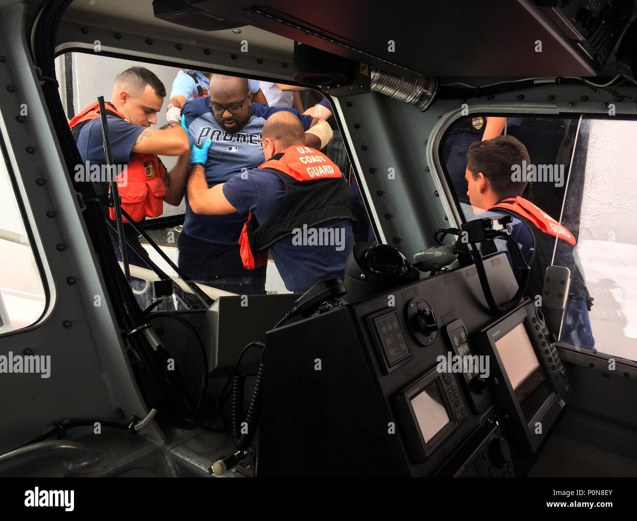 A Coast Guard boatcrew aboard a 45-foot Response Boat-Medium (RBM) from ...
