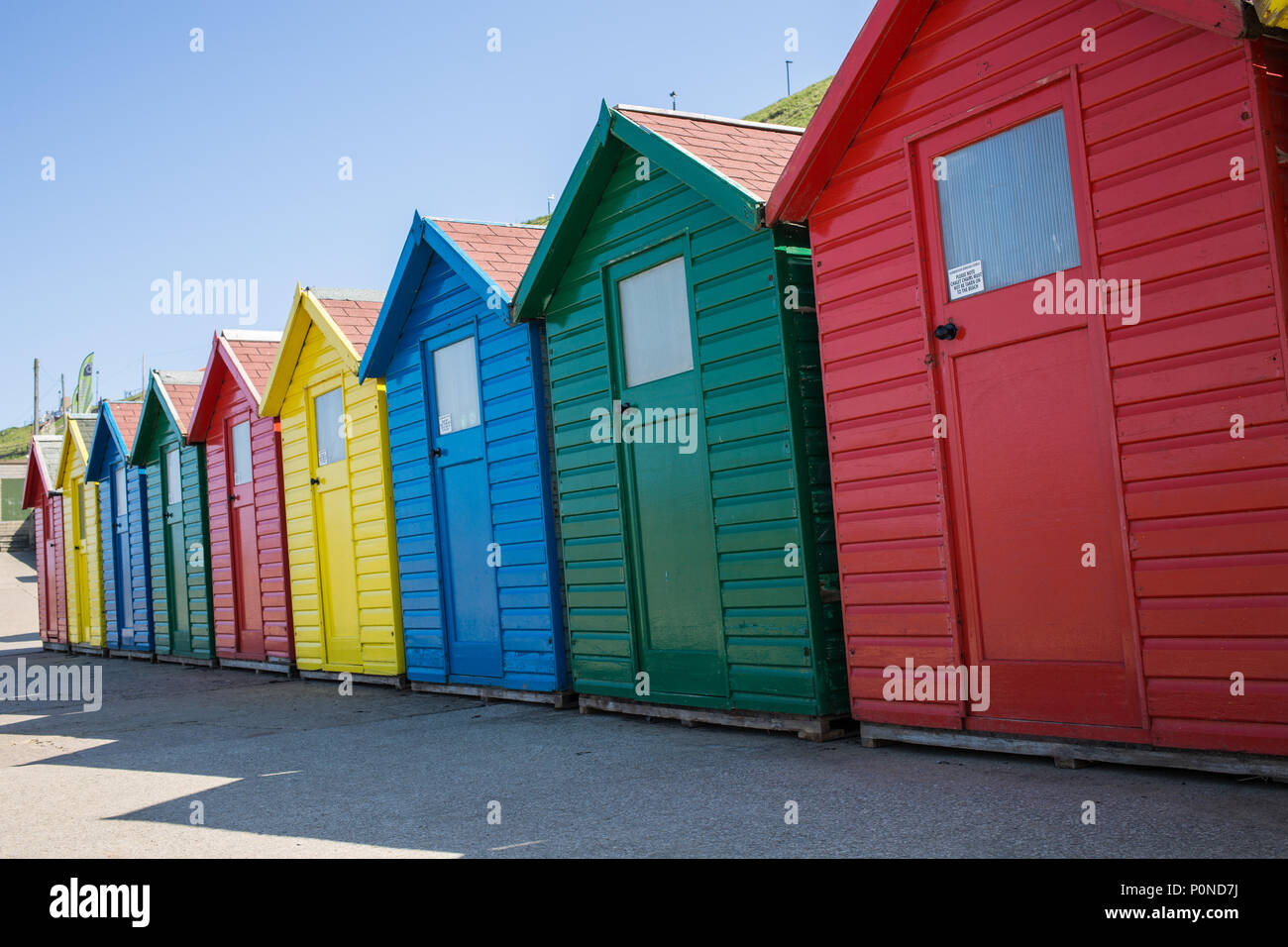 Row of colourful huts hi-res stock photography and images - Alamy