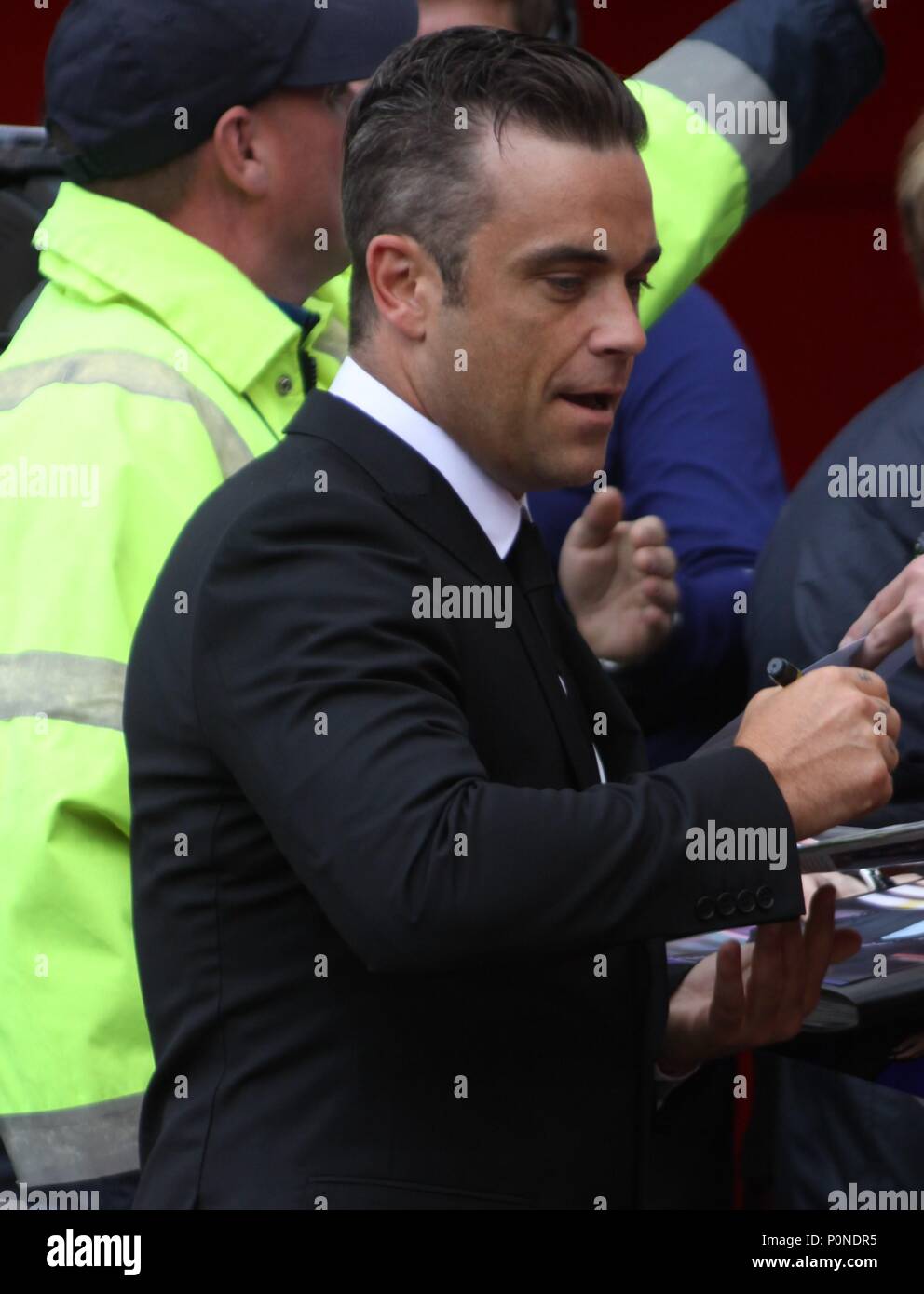 Manchester,Uk, Robbie Williams plays at Soccer aid in aid of unicef ...
