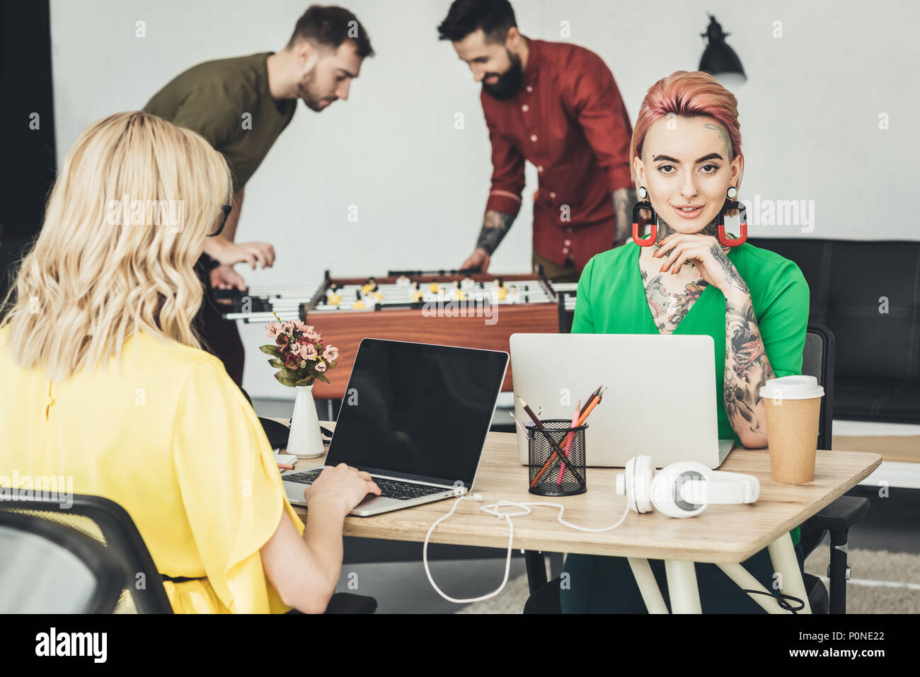 Office workers playing football hi-res stock photography and images - Alamy
