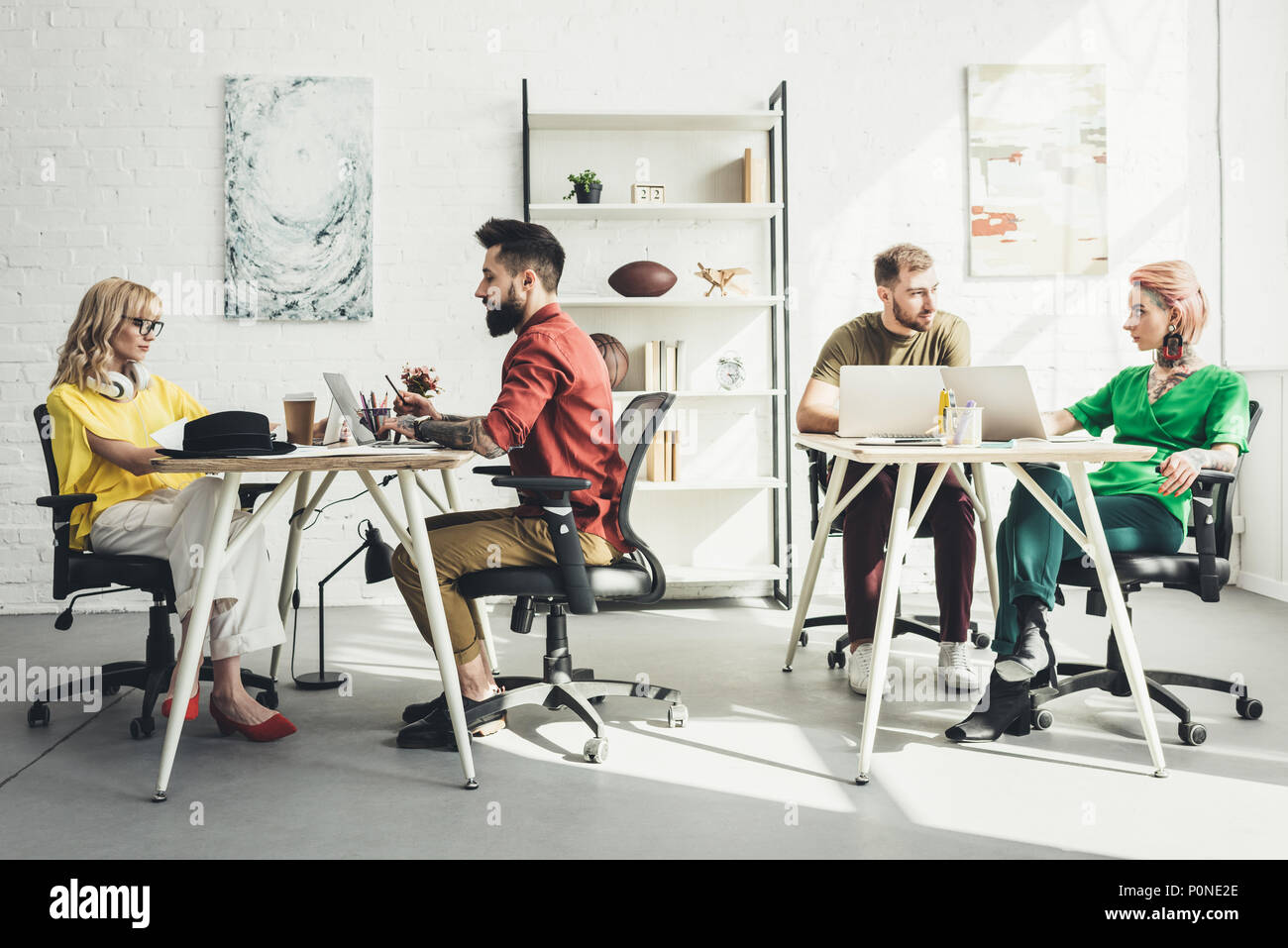 group of young creative workers working on project in office Stock ...