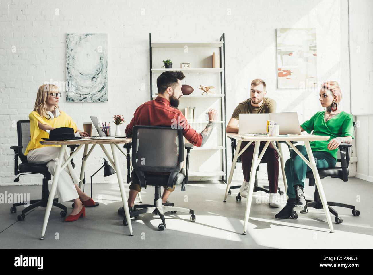 group of young creative workers working on project in office Stock ...