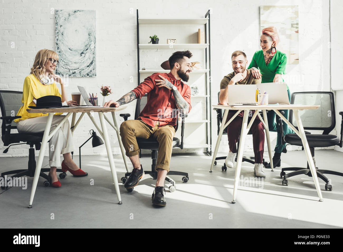 group of young creative workers working on project in office Stock ...