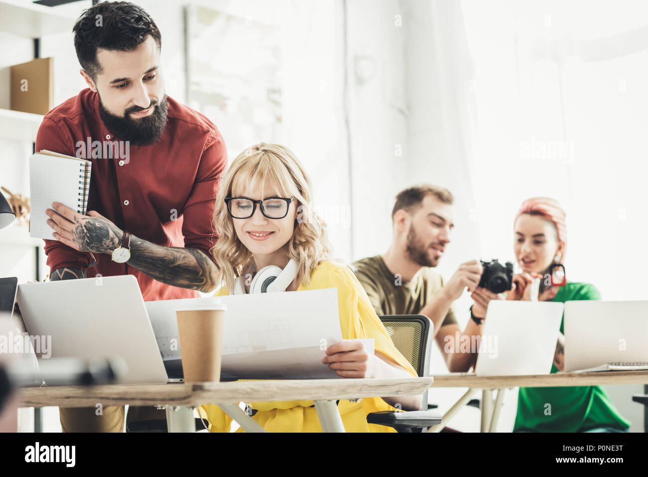 Tattoos office workers hi-res stock photography and images - Alamy