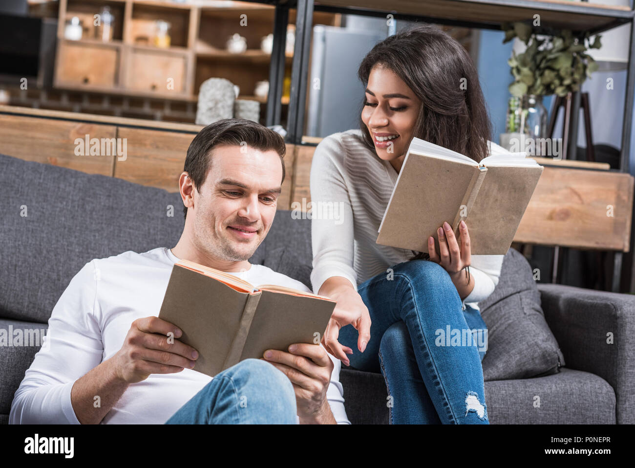 African couple reading books hi-res stock photography and images - Alamy
