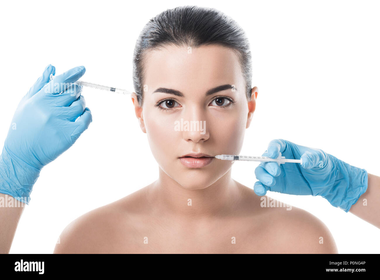 cosmetologists making beauty injections for beautiful girl isolated on ...