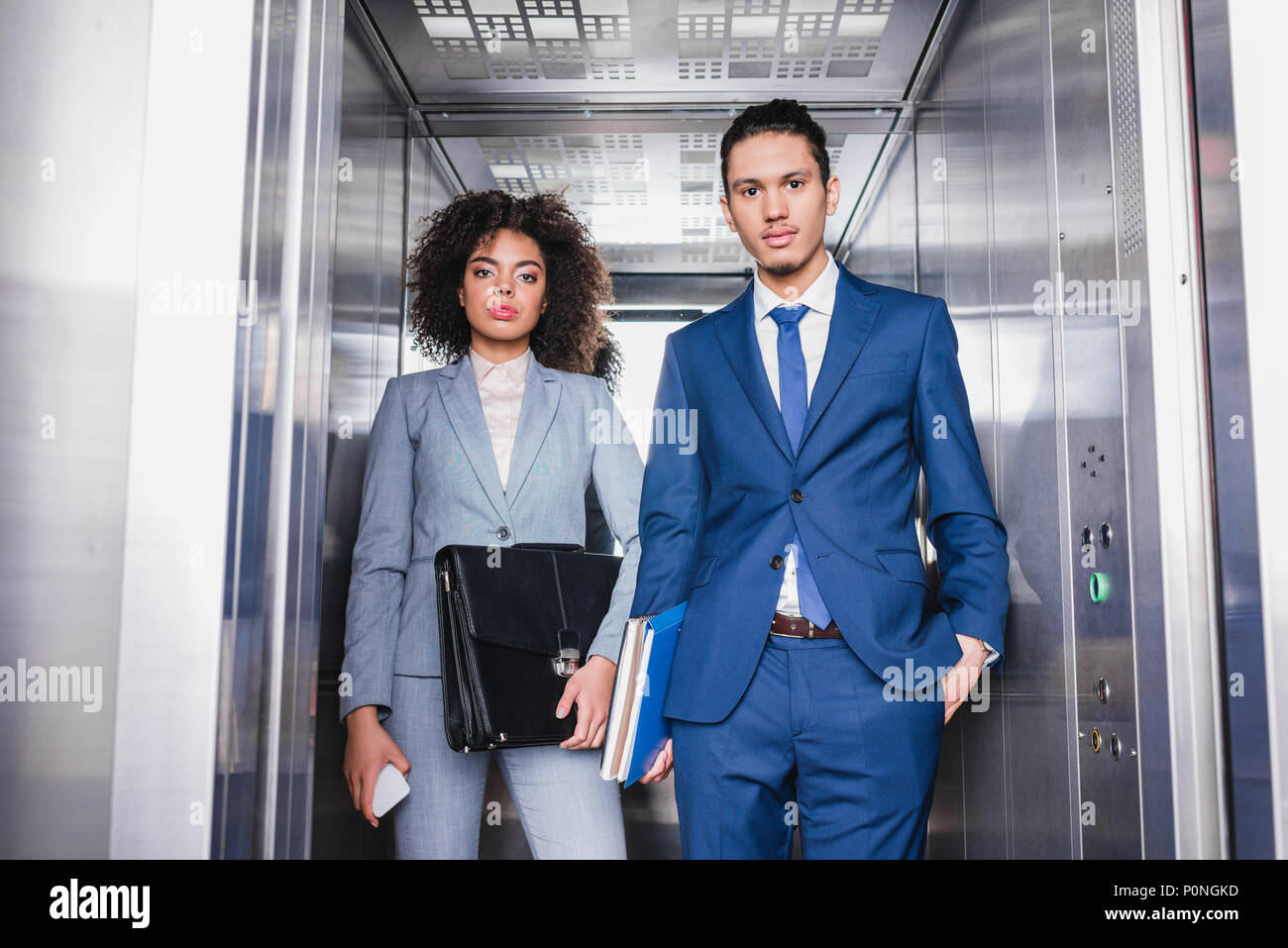 Riding elevator hi-res stock photography and images - Alamy