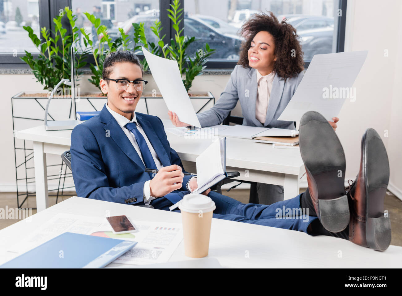 Businessman businesswoman working tables hi-res stock photography and ...