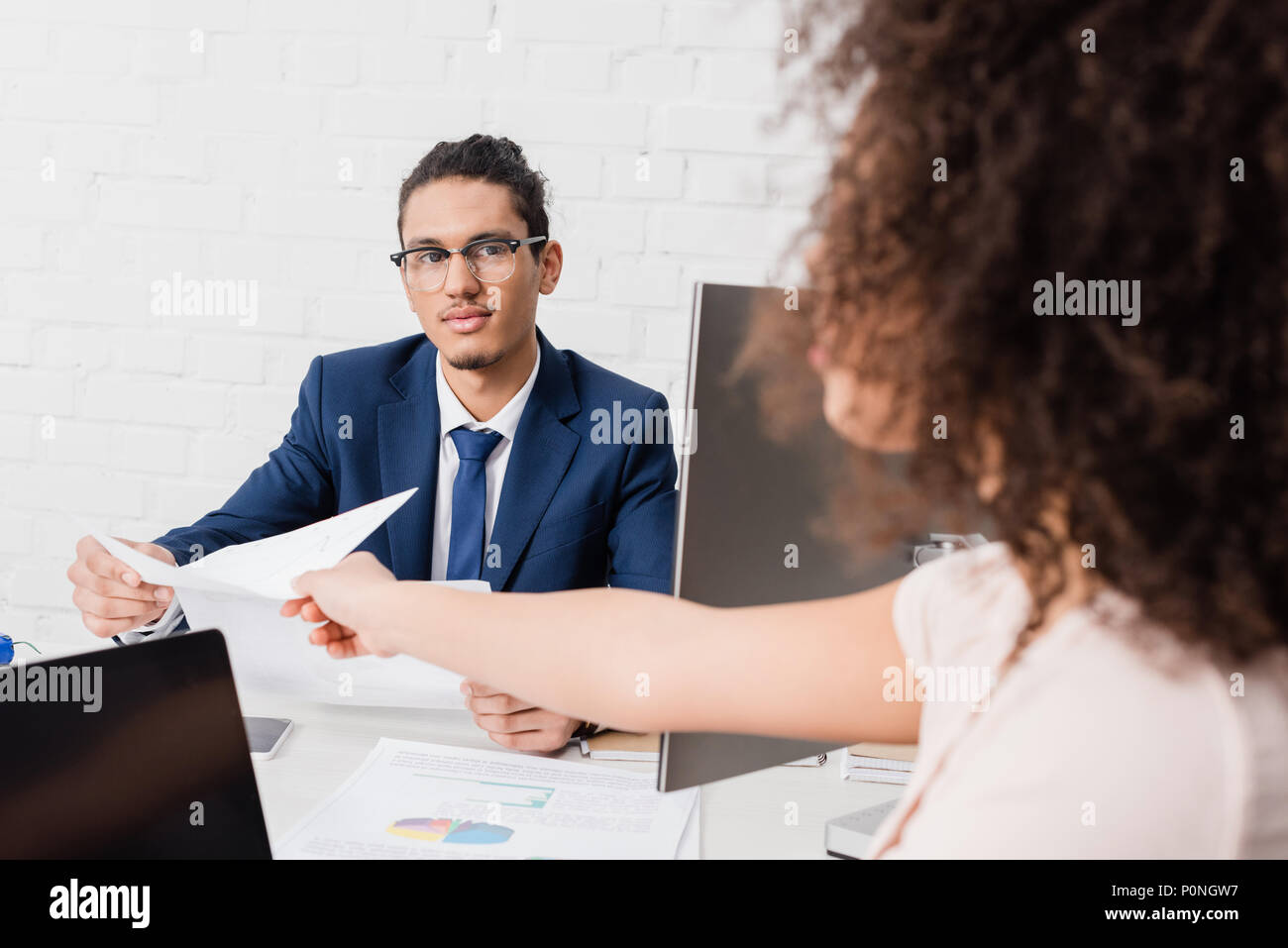 Passing documents hi-res stock photography and images - Alamy