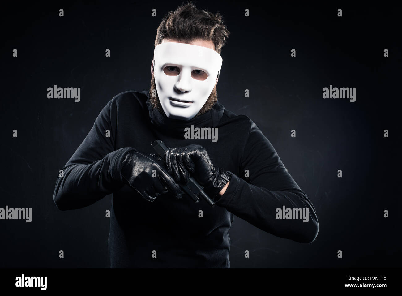 Robber in black clothes hi-res stock photography and images - Alamy