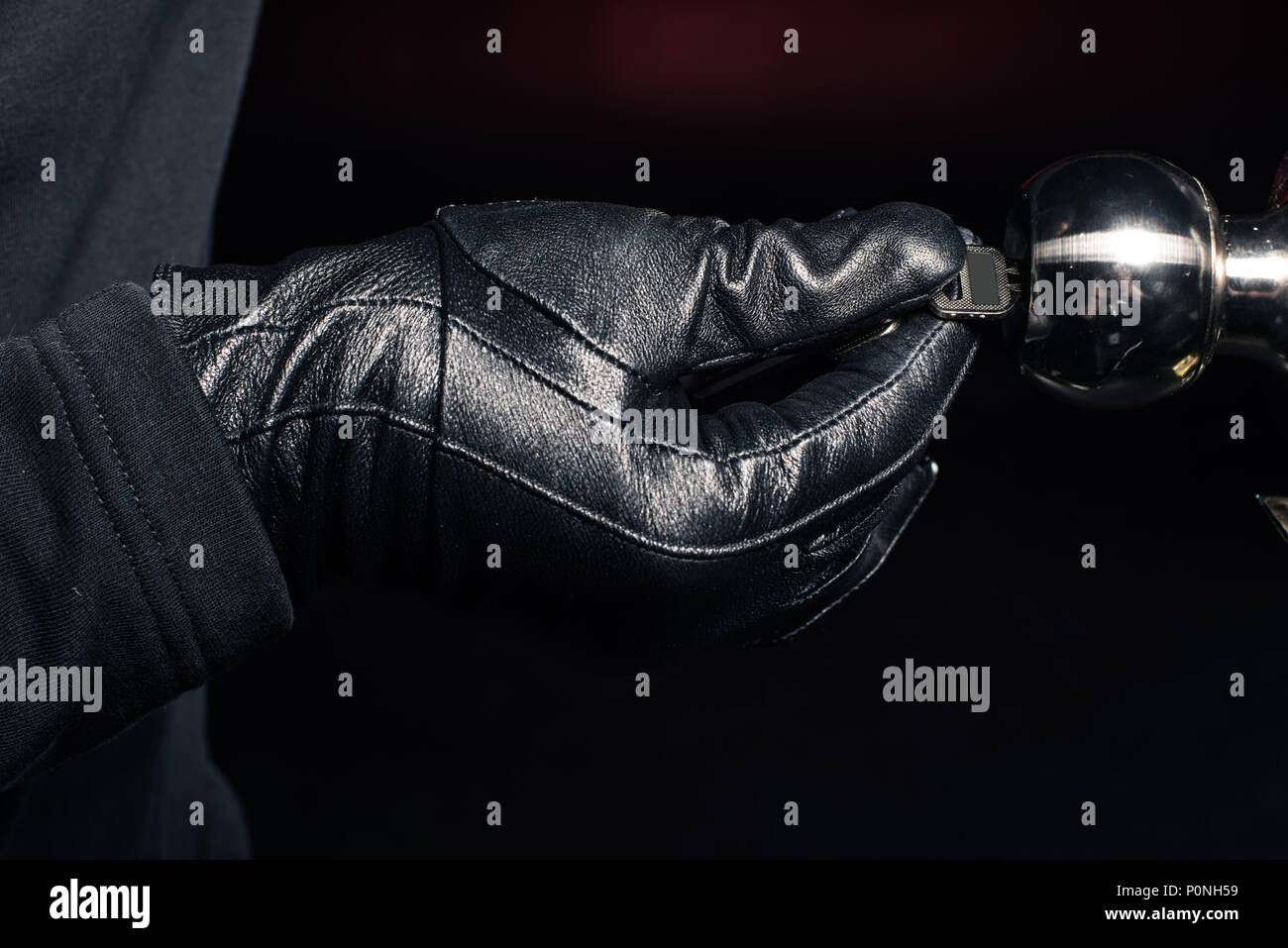 Close-up view of male hand opening lock with key Stock Photo - Alamy