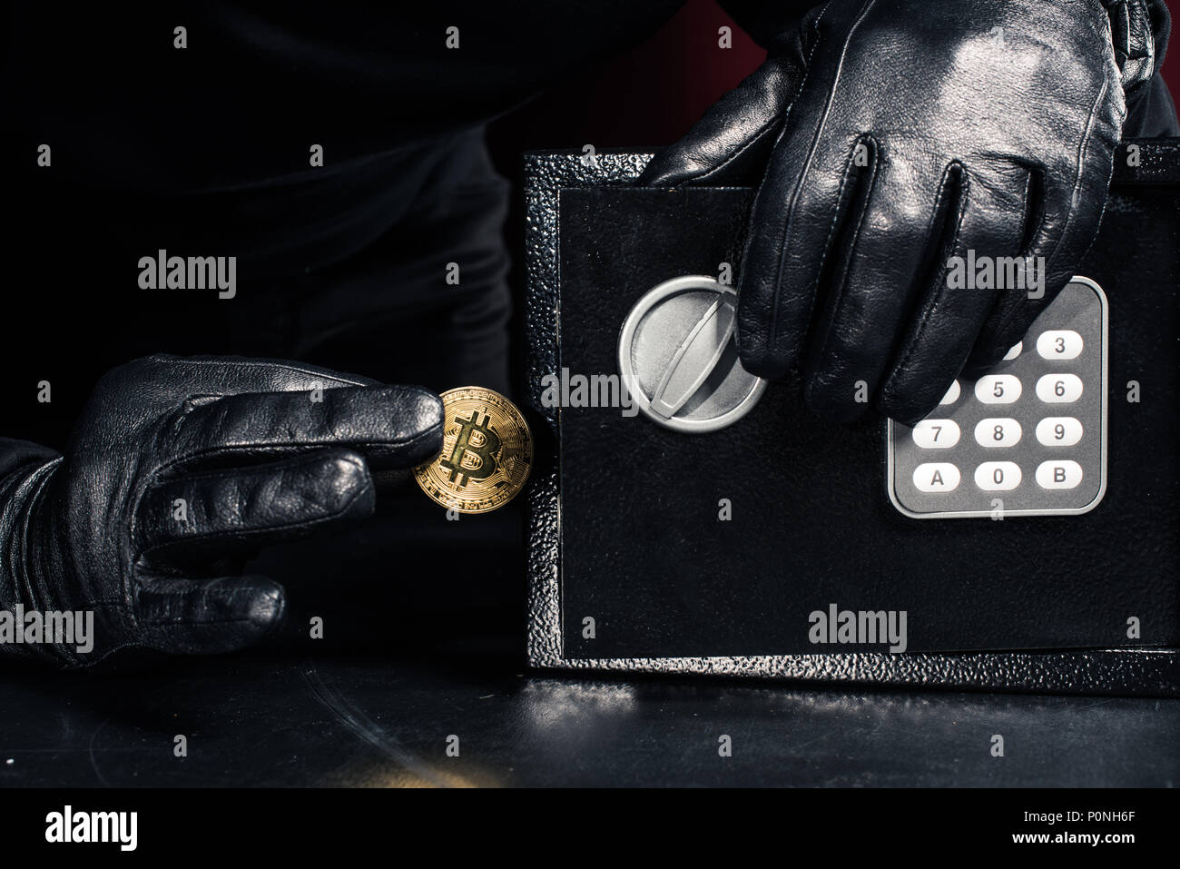 Thief stealing money from safe hi-res stock photography and images - Alamy