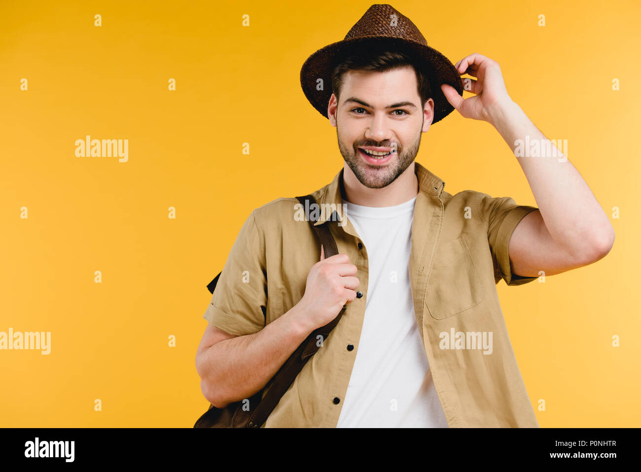 Adjusting hat hi-res stock photography and images - Alamy