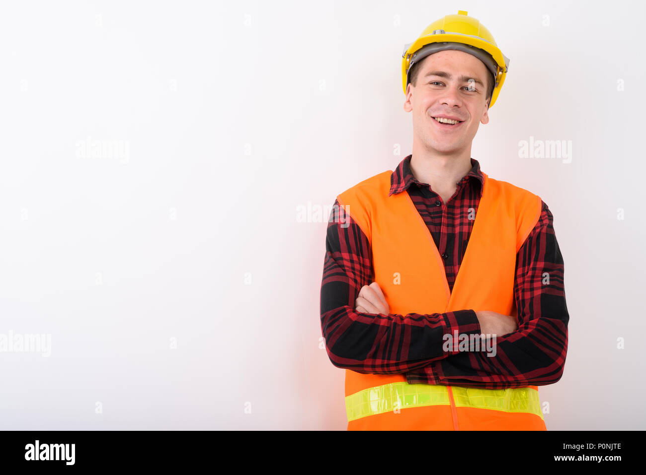 Young handsome man construction worker against white background Stock ...