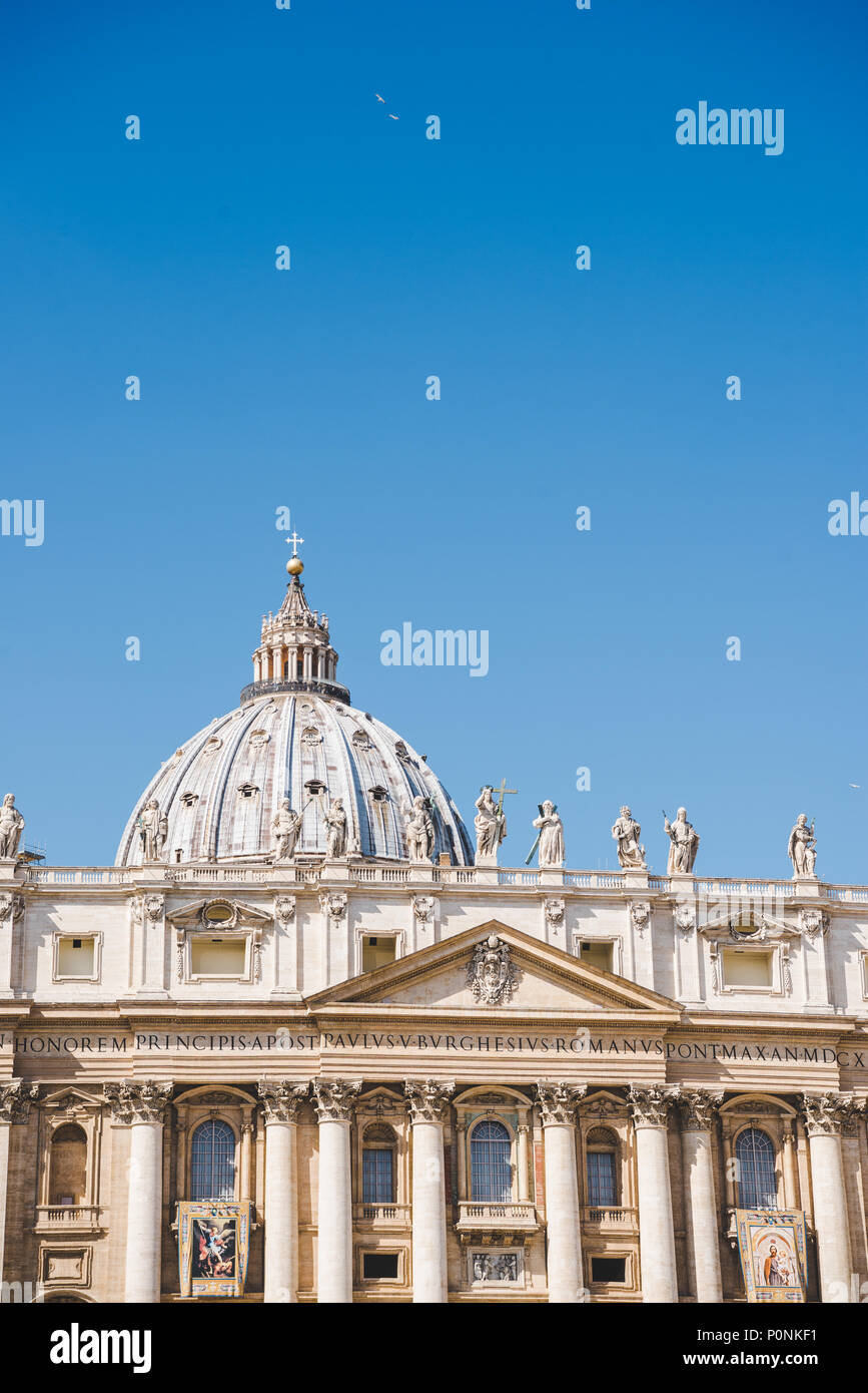 dome of St. Peter's Basilica under blue sky, Vatican, Italy Stock Photo ...