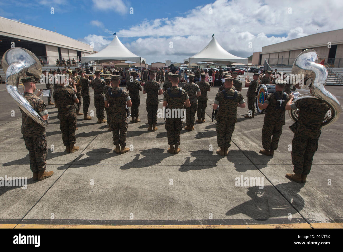 The Marine Corps Forces, Pacific Band performs during a change of ...
