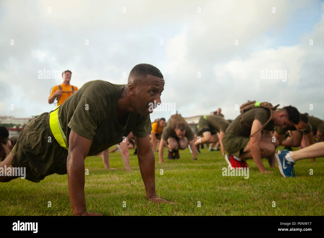 CAMP FOSTER, OKINAWA, JAPAN- Marines and Sailors participate in ...