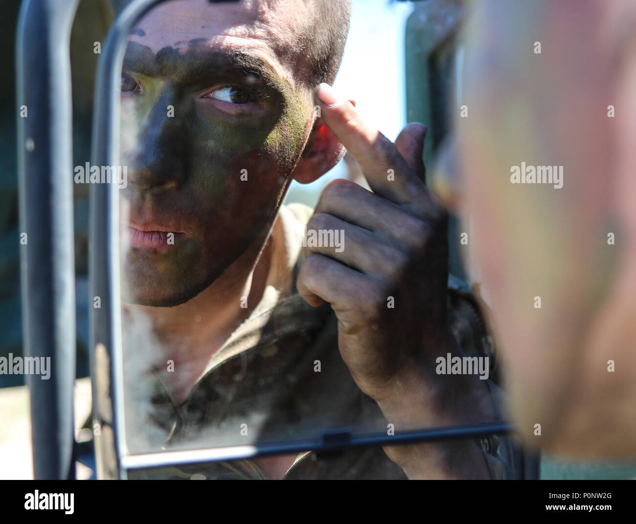 U.S. Army Sgt. Anthony Heckart, an Interim Armored Vehicle Stryker ...
