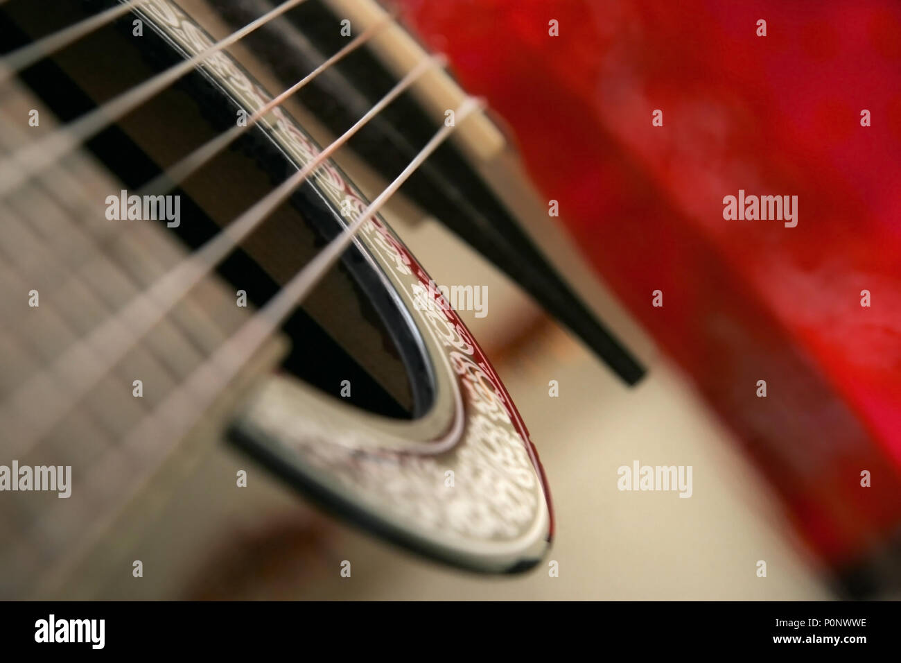 Detail on classical guitar six string, shallow depth of focus, with ...
