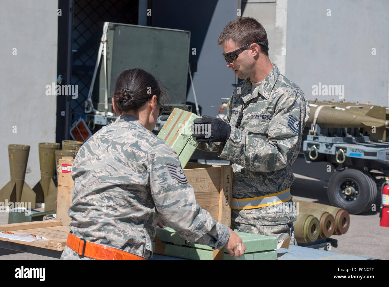 U.S Air Force Tech. Sgt. Micah Parcher, line delivery munitions and ...