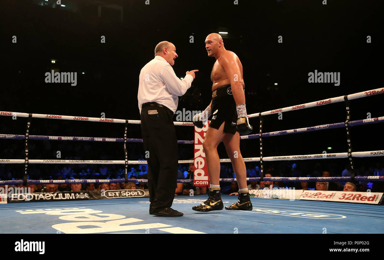 Referee Terry O'Conner (left) speaking to Tyson Fury during the ...
