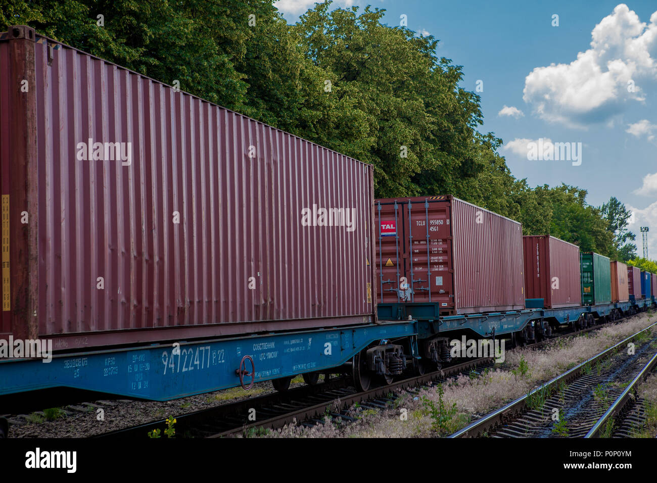 Container loaded on train wagons on a railway Stock Photo - Alamy